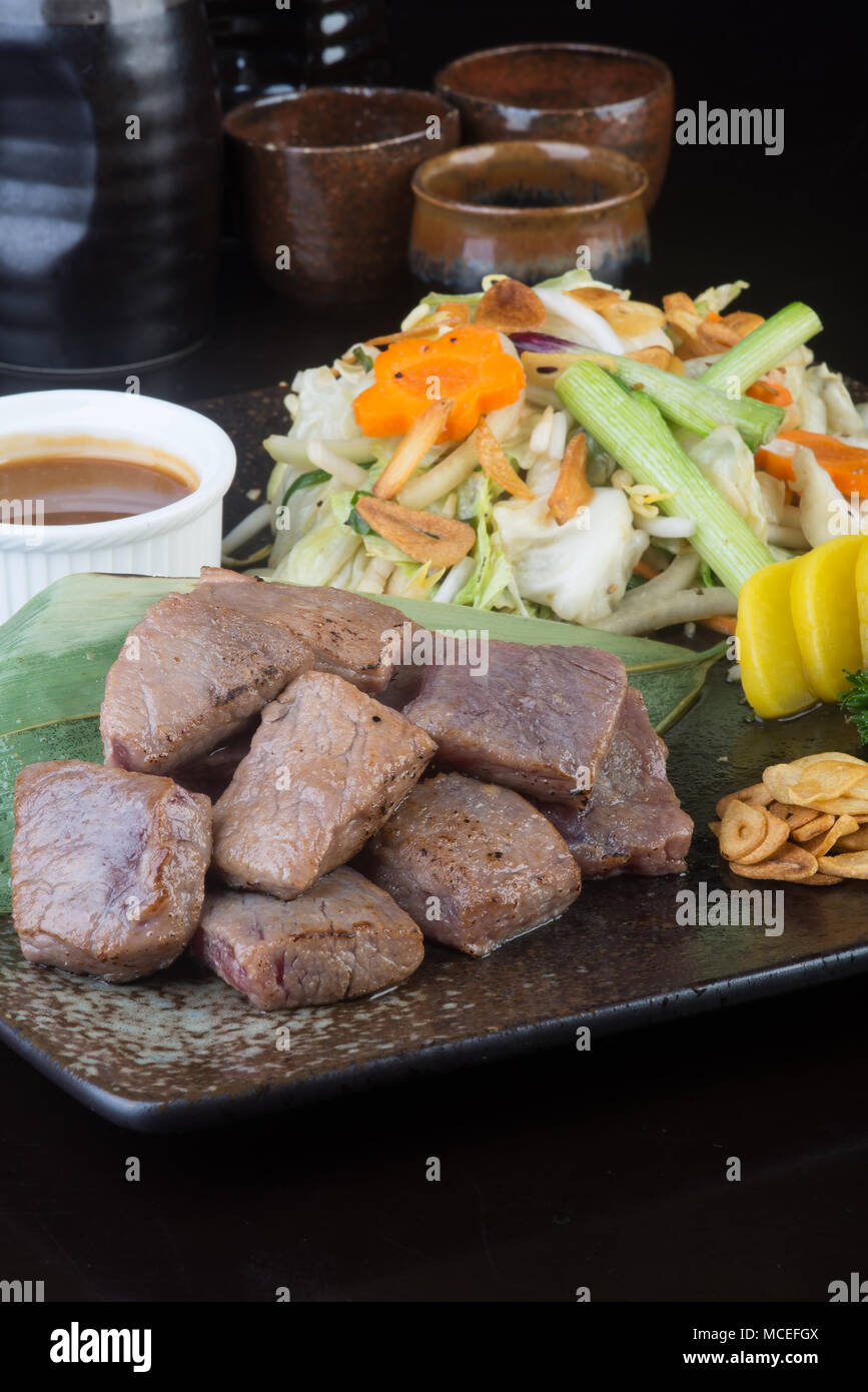 japanese cuisine. beef cube on background Stock Photo - Alamy