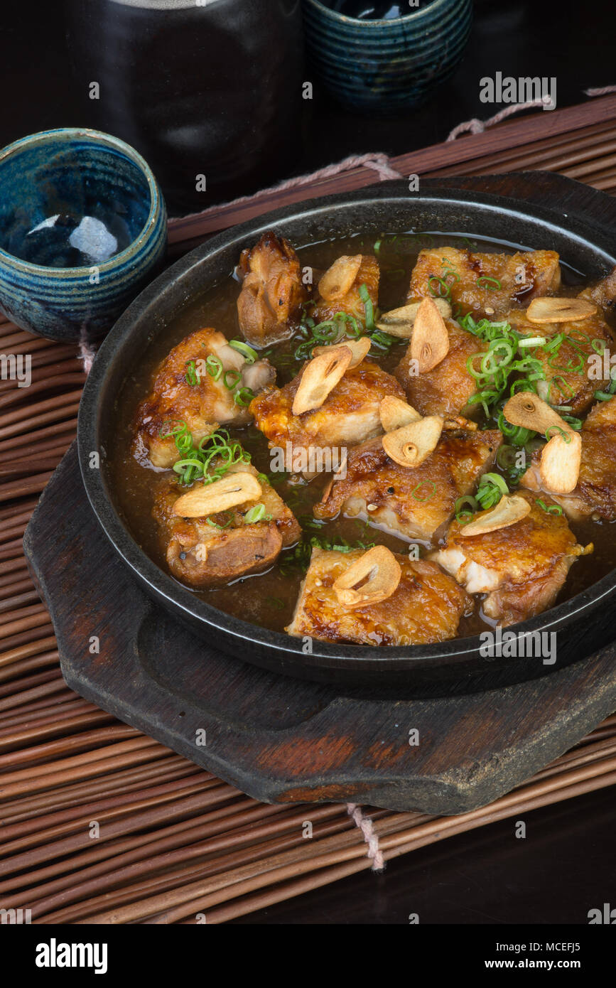 japanese cuisine. hot plate chicken on background Stock Photo - Alamy