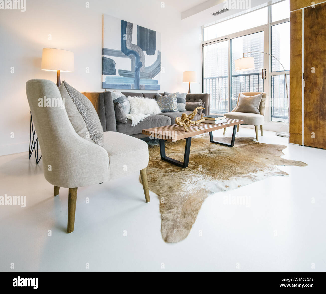 Interior of modern furnished living room Stock Photo - Alamy