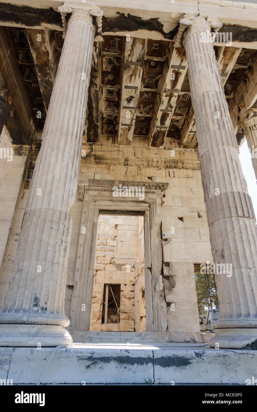 Low angle view of architectural columns at The Erechtheum, Athens ...