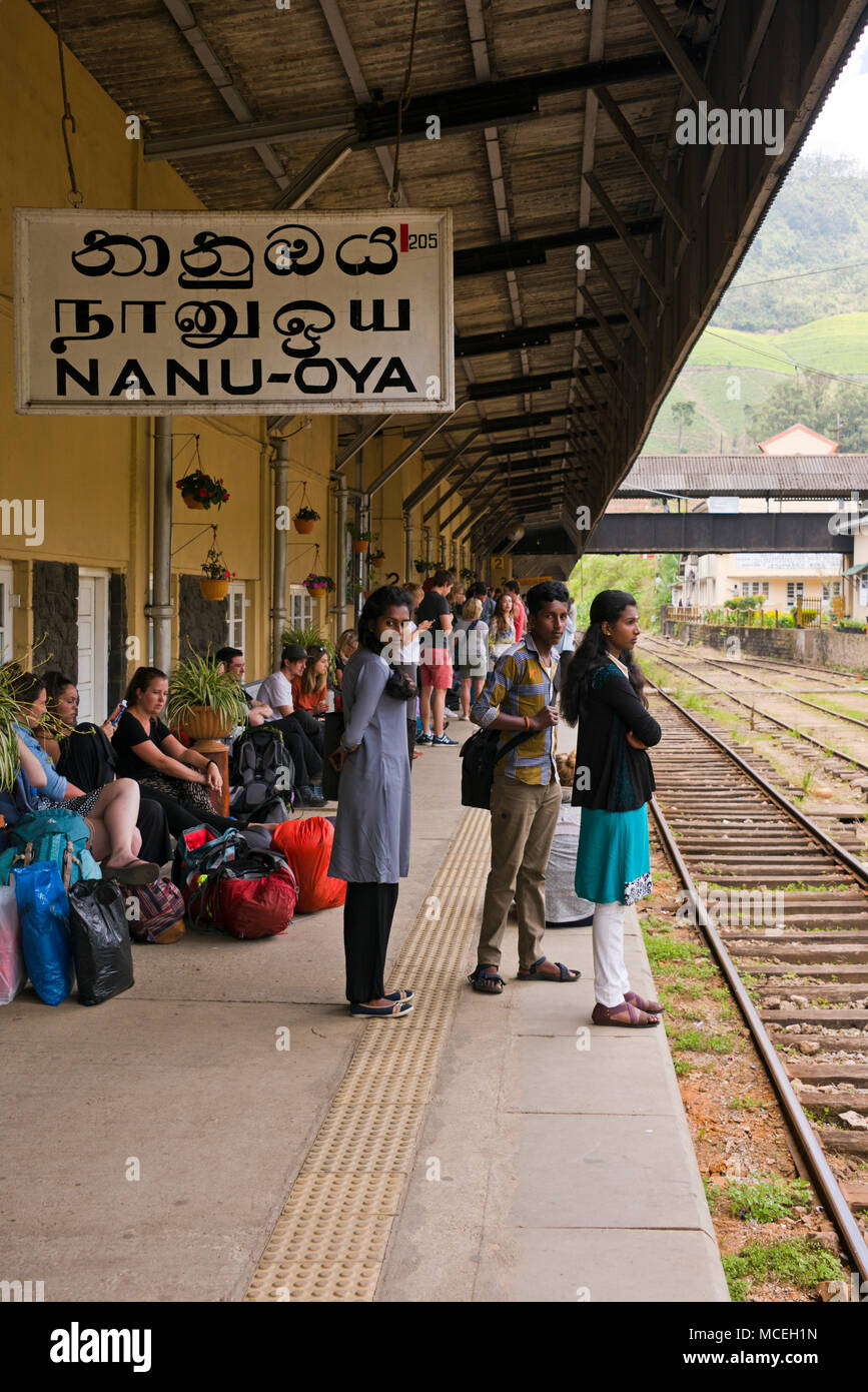 Vertical view of people waiting at Nanu-oya Train Station in the ...