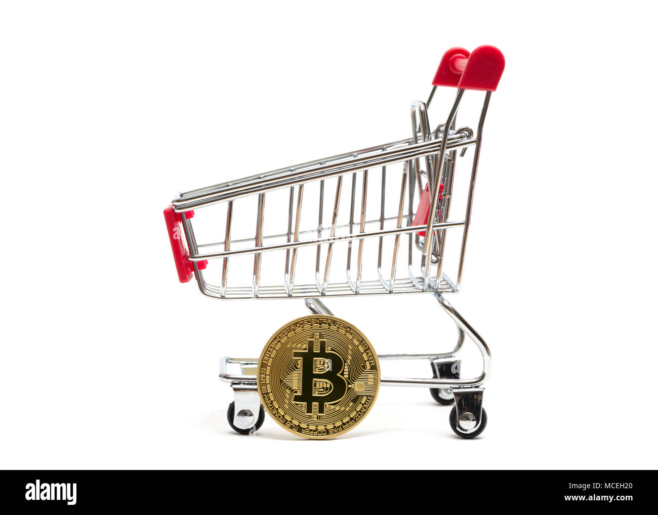 Bitcoin and shopping cart on white background : economy concept Stock ...