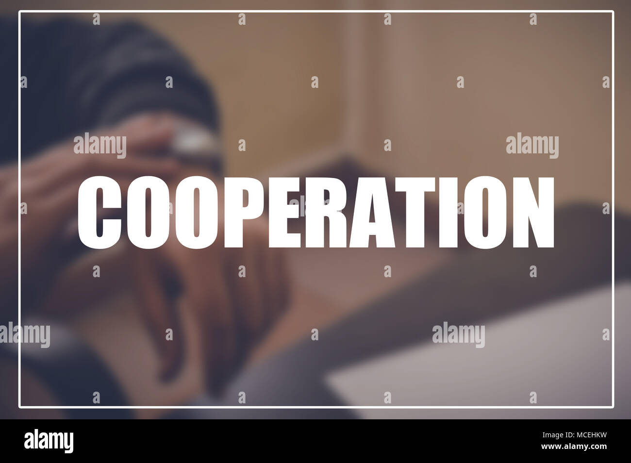 Cooperation word with business blurring background Stock Photo - Alamy