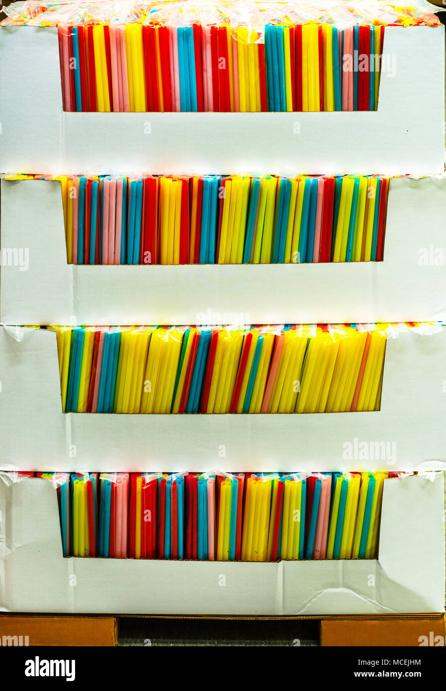 stacked packs of plastic straws Stock Photo - Alamy