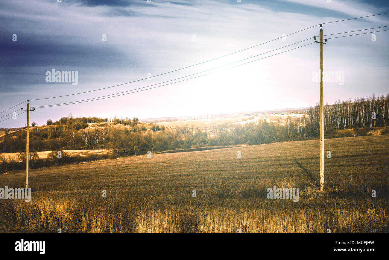 landscape with telegraph poles Stock Photo - Alamy