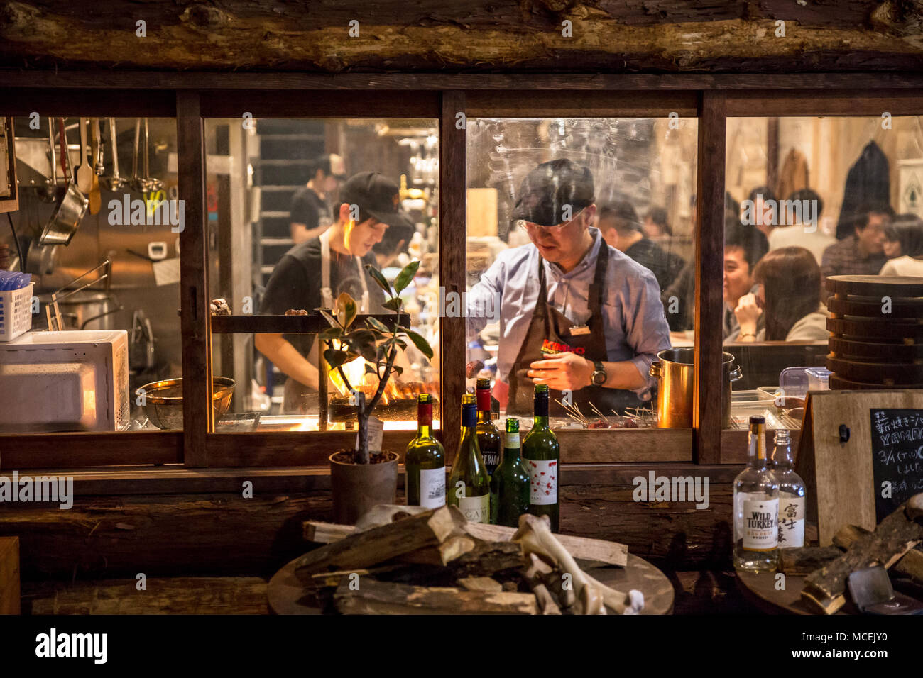 Osaka, Japan - April 14, 2018: Restaurant workers prepare stick food in ...