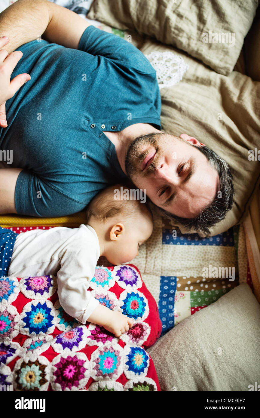 Baby And Daddy Sleeping