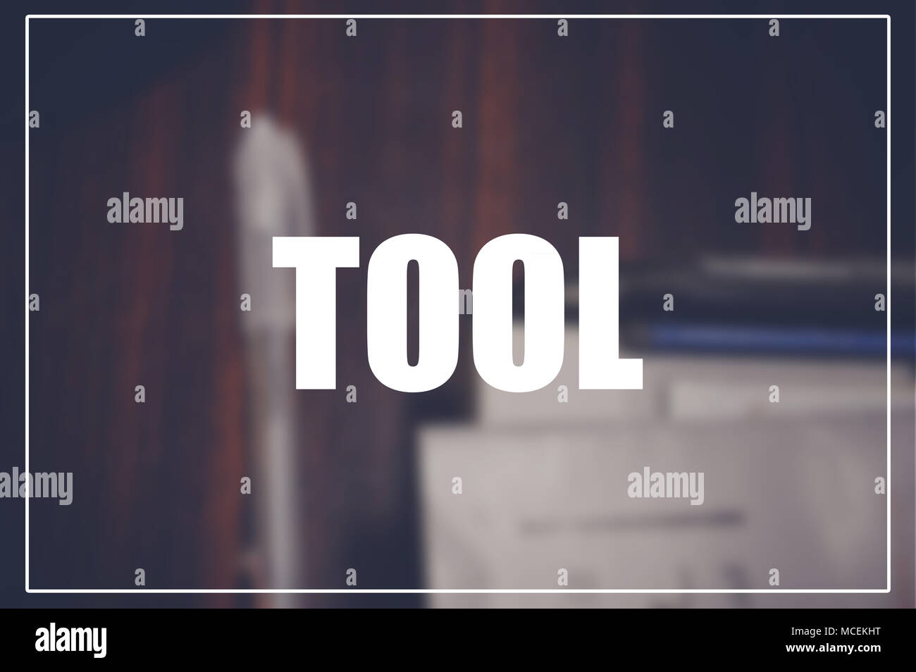 Tool word with blurring business background Stock Photo - Alamy