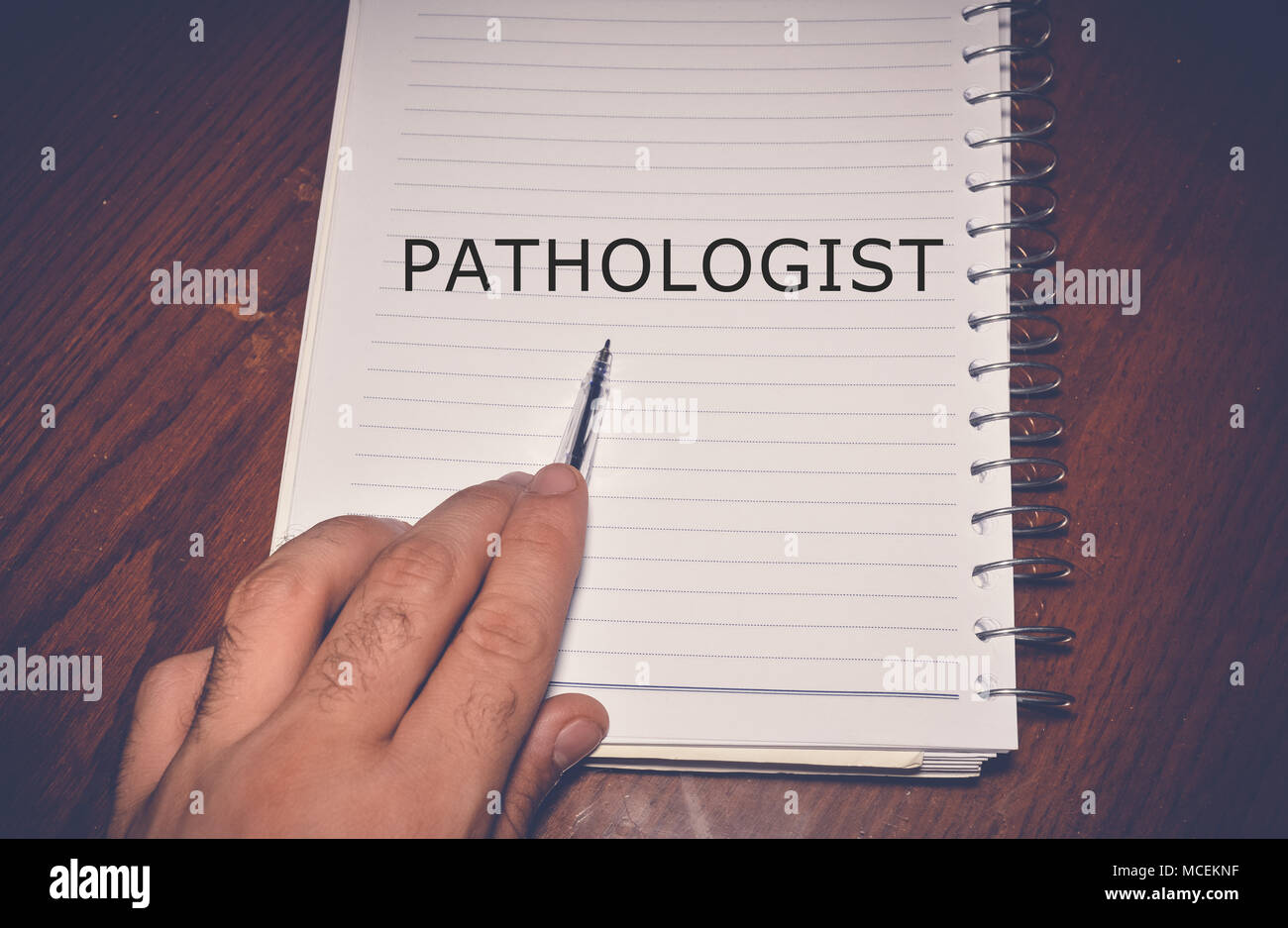 Pathologist word written on white paper Stock Photo - Alamy