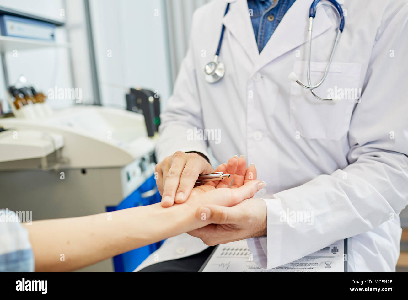 Taking the pulse hi-res stock photography and images - Alamy