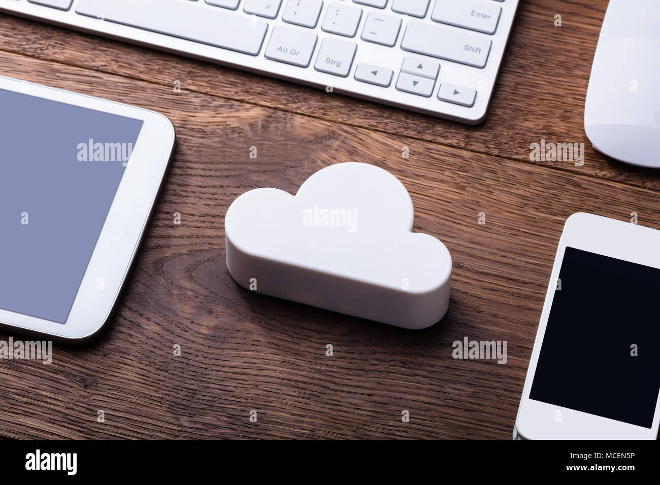 White Cloud Block With Digital Tablet, Mobile, Keyboard And Mouse On ...