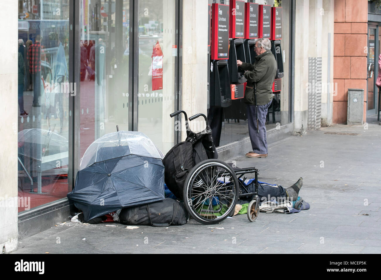 Lone man sleeping hi-res stock photography and images - Alamy