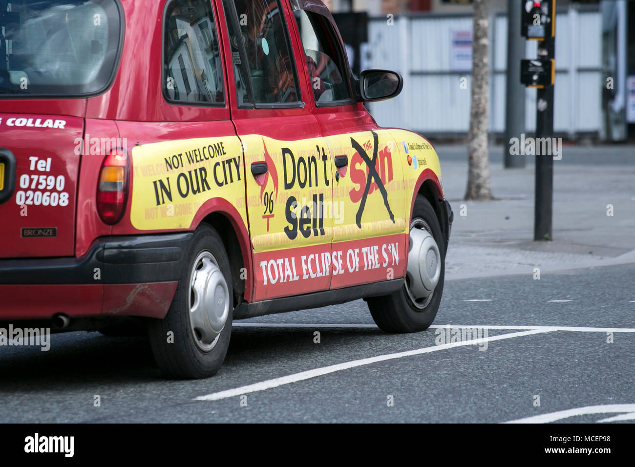 Do not buy The Sun newspaper on side of taxi in Liverpool city centre ...
