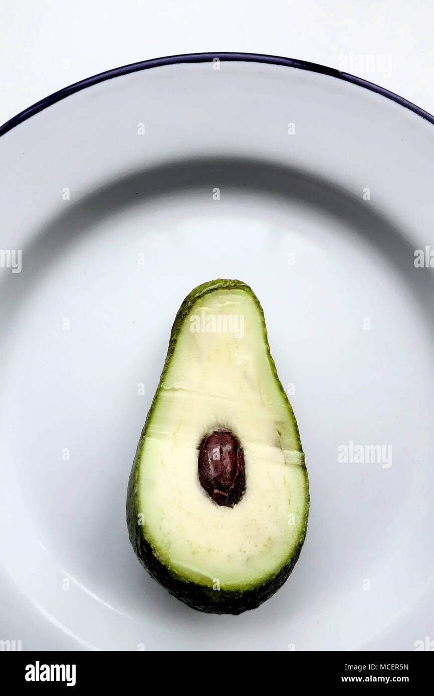 Half avocado plate hi-res stock photography and images - Alamy