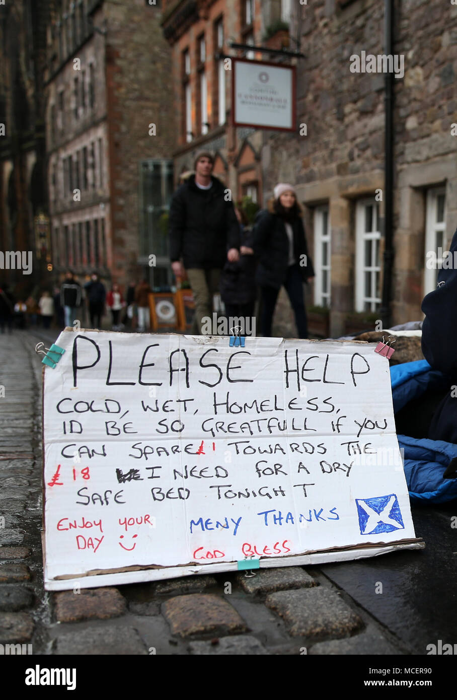 A homeless person and their dog on the Royal Mile in Edinburgh Stock ...