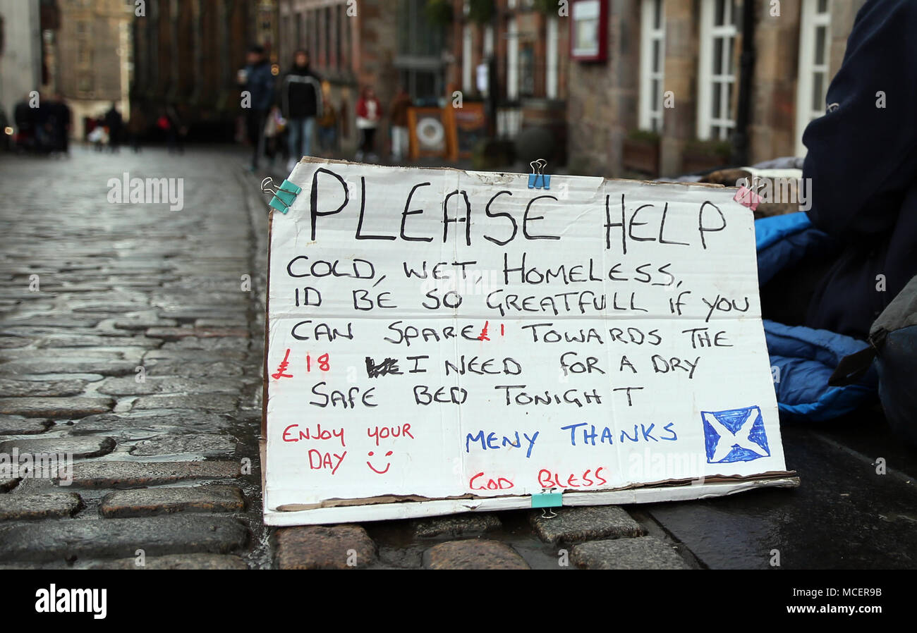 A homeless person and their dog on the Royal Mile in Edinburgh Stock ...