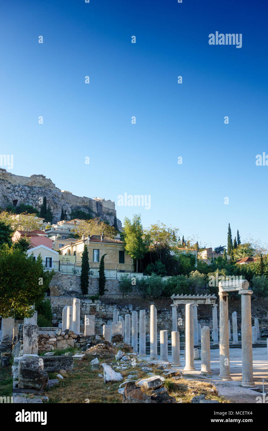 Ancient columns and residential building, Athens, Greece Stock Photo ...