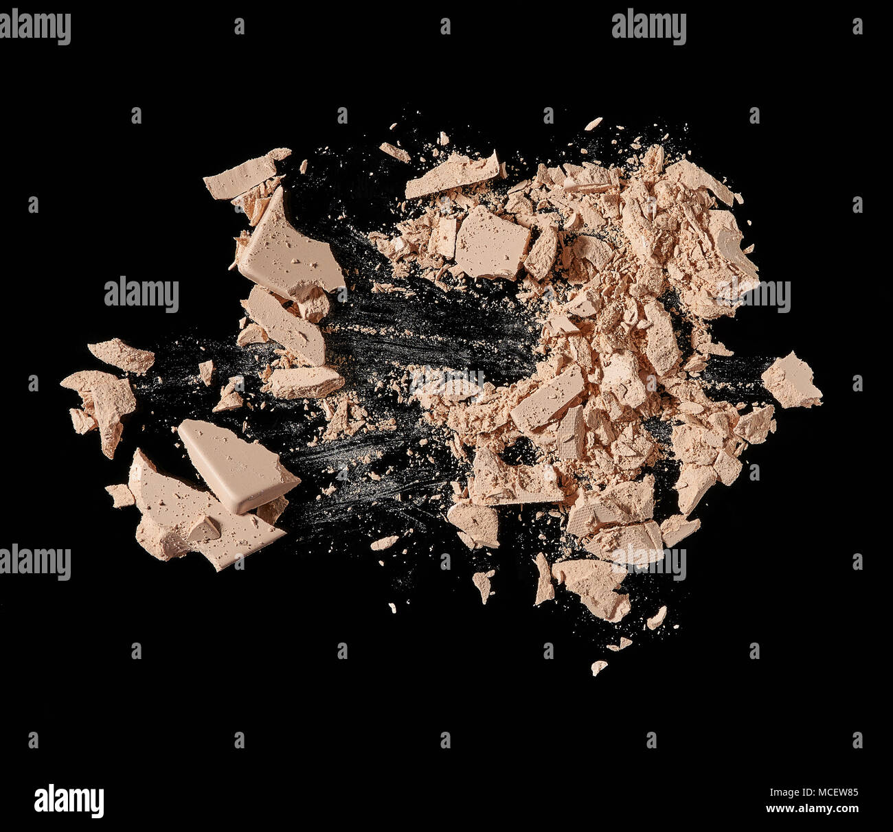 Make up crushed light beige shadow on black background. Light beige ...