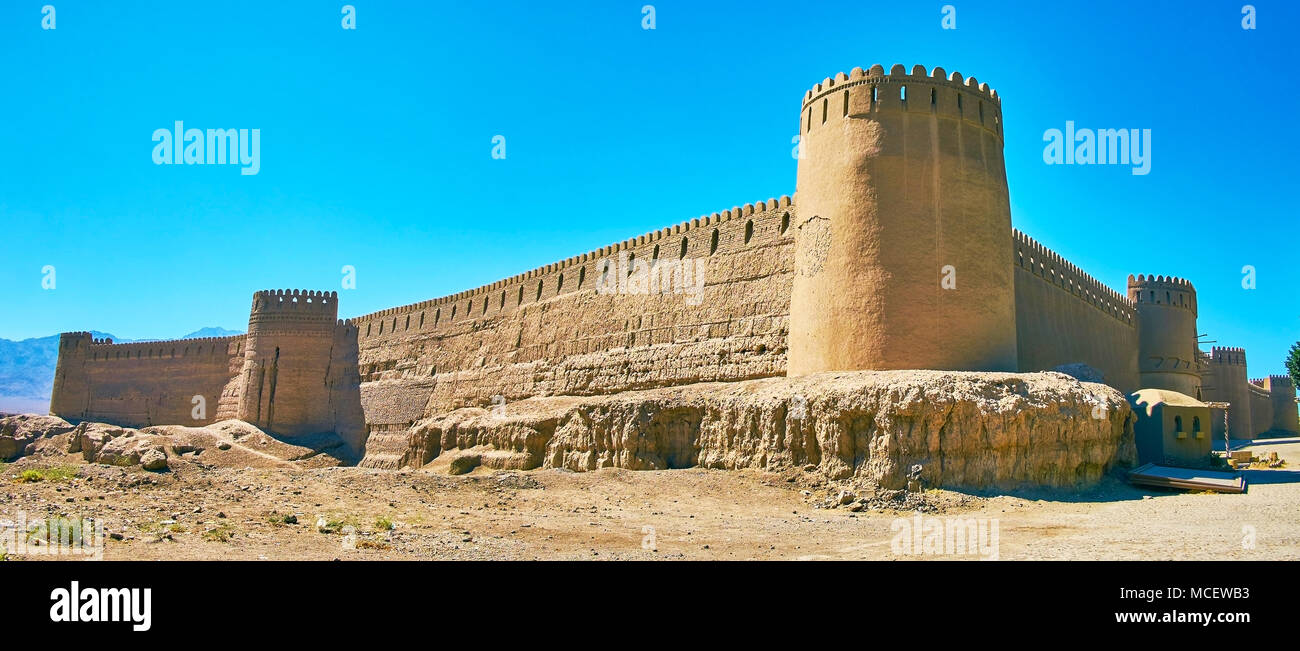 The corner view of Rayen citadel with massive circle tower and tall ...