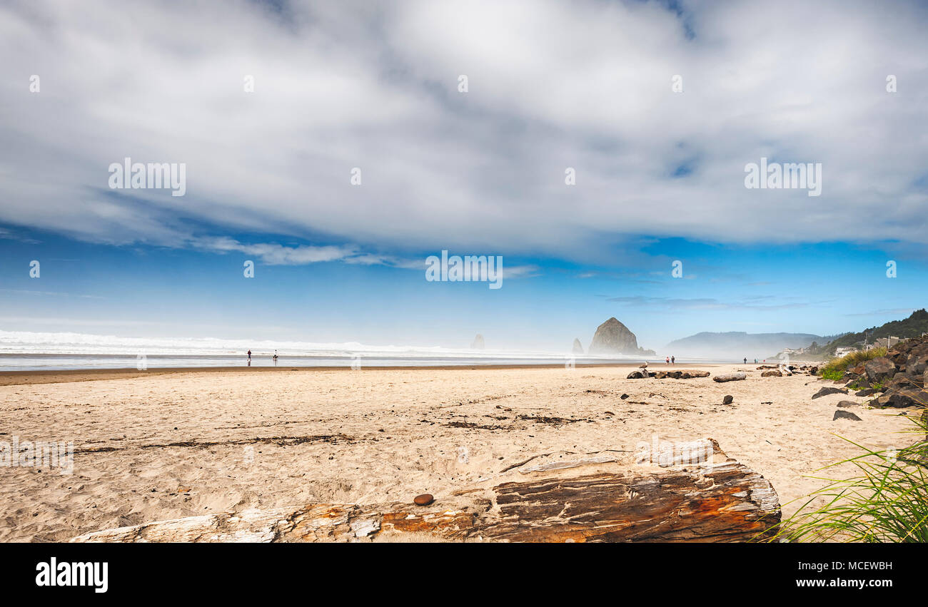 Cannon Beach, Oregon, USA - September 28.02010Blue skies emerge beneath ...