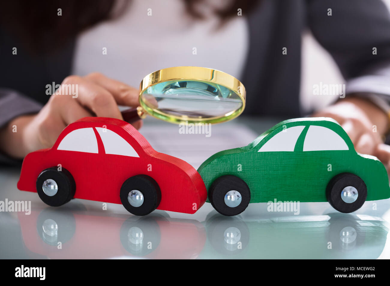 Car front in magnifier glass hi-res stock photography and images - Alamy