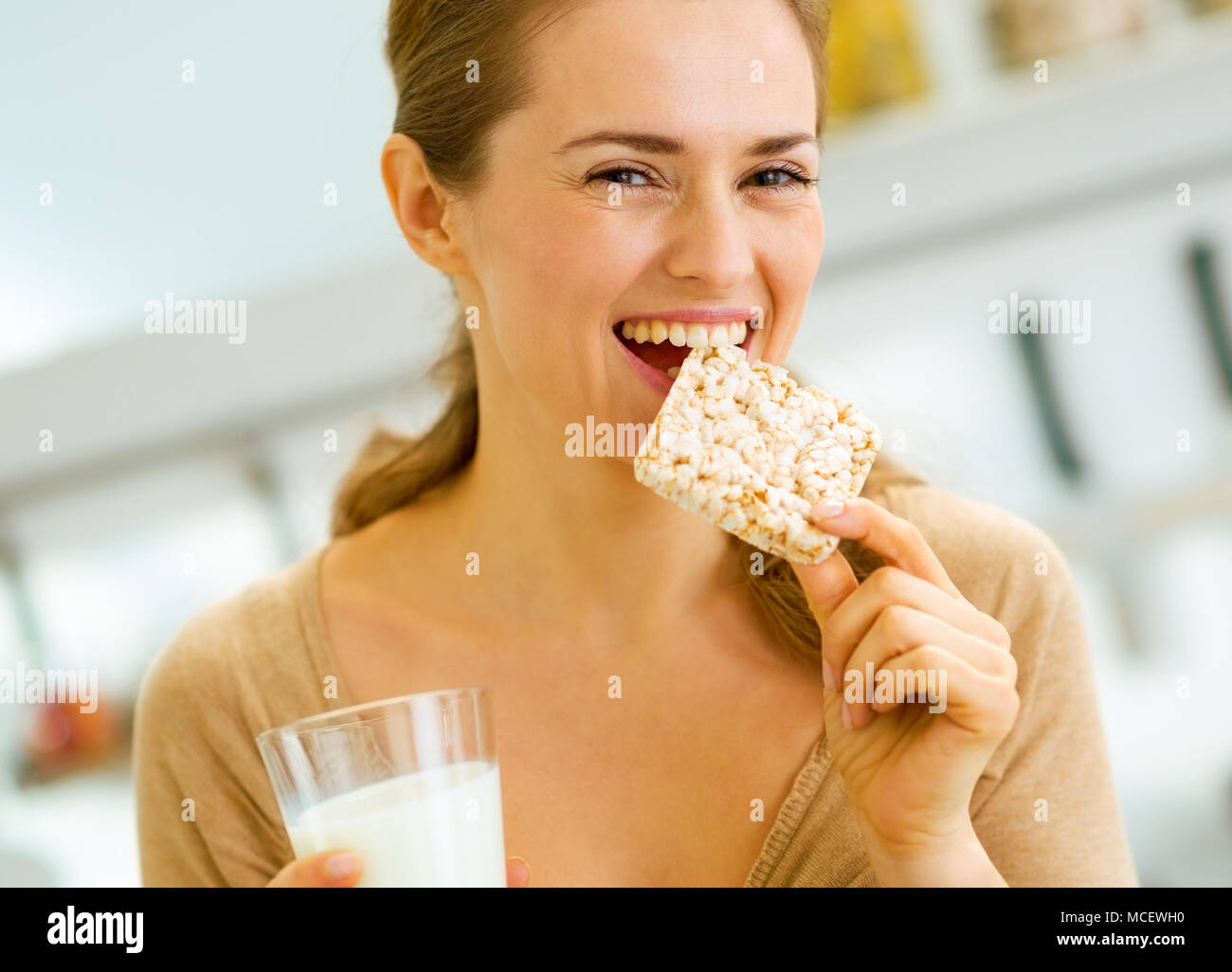Woman eating cereal bread hi-res stock photography and images - Alamy