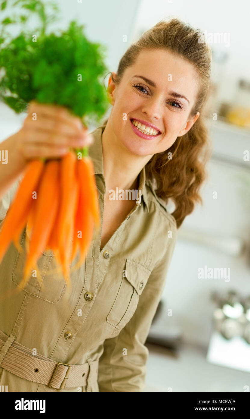 Giving carrot hi-res stock photography and images - Alamy