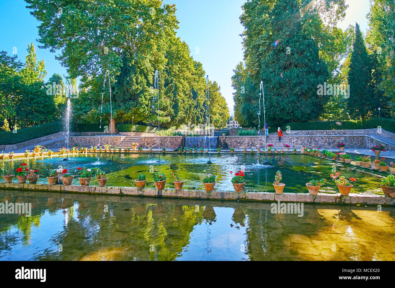 The terraced Shazdeh Garden with fountains and ponds along the central ...