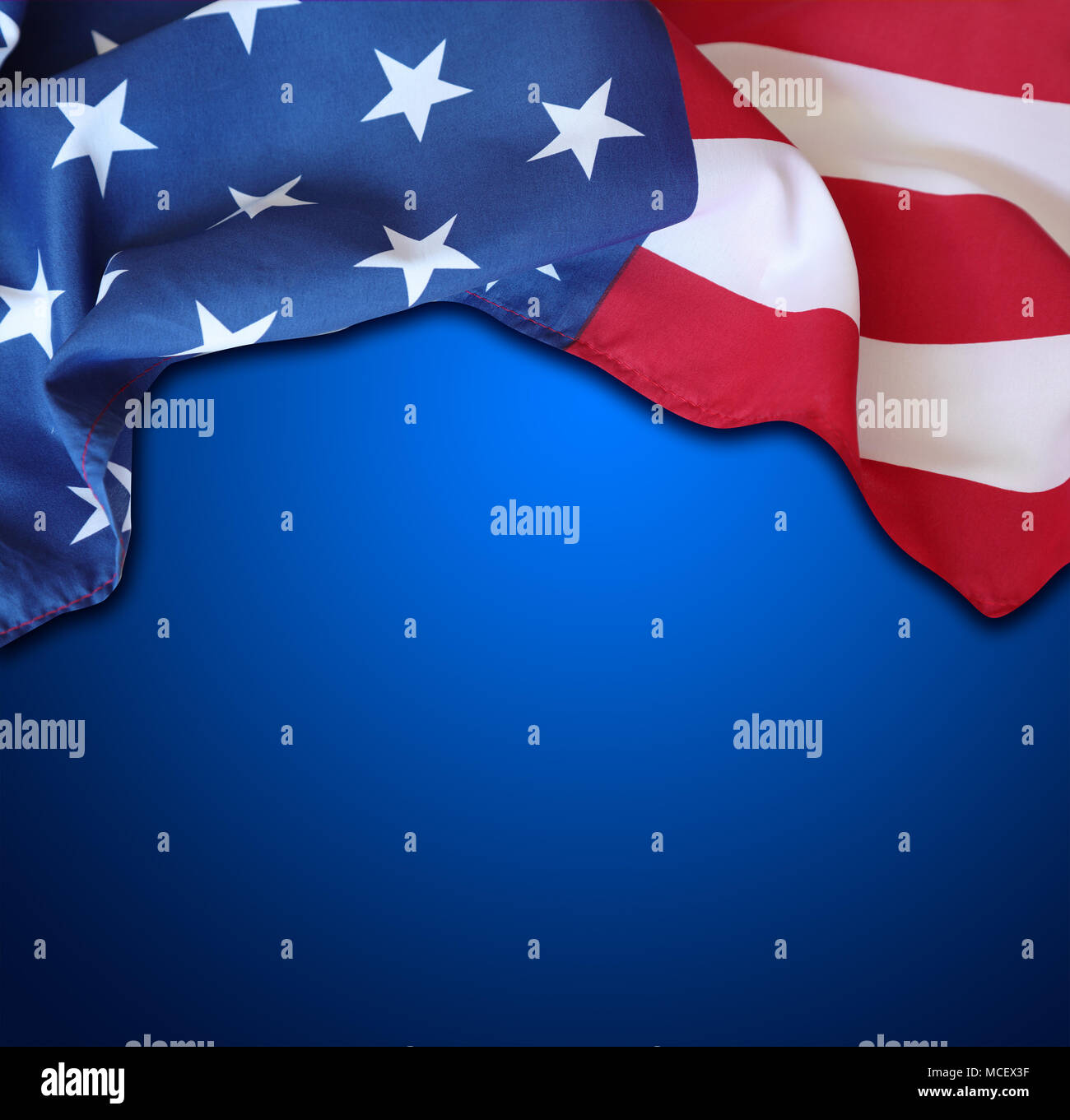 American flag on blue background Stock Photo - Alamy