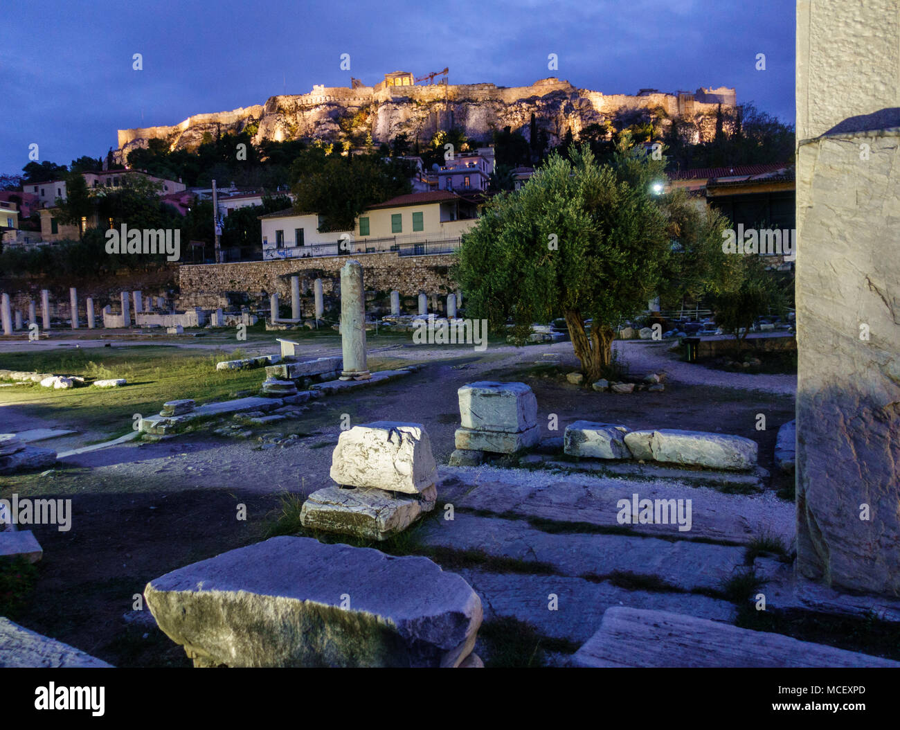 Ancient columns and residential building, Athens, Greece Stock Photo ...