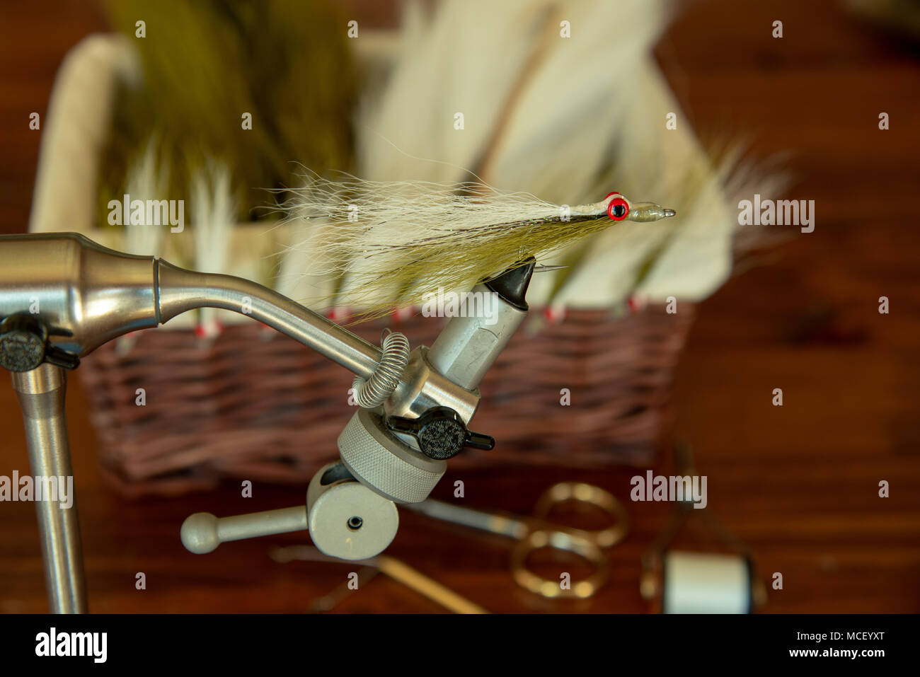 Tying a classic saltwater fly pattern Stock Photo - Alamy