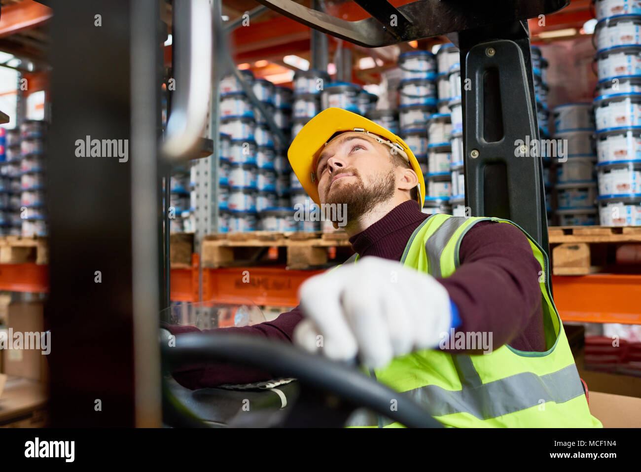 Mover Using Forklift in warehouse Stock Photo - Alamy
