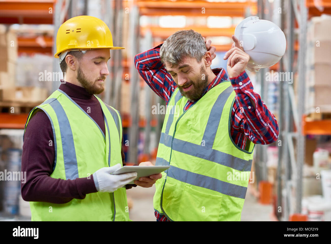 Young man working in warehouse hi-res stock photography and images - Alamy