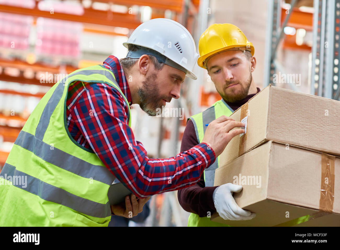Man in modern warehouse warehouse hi-res stock photography and images ...