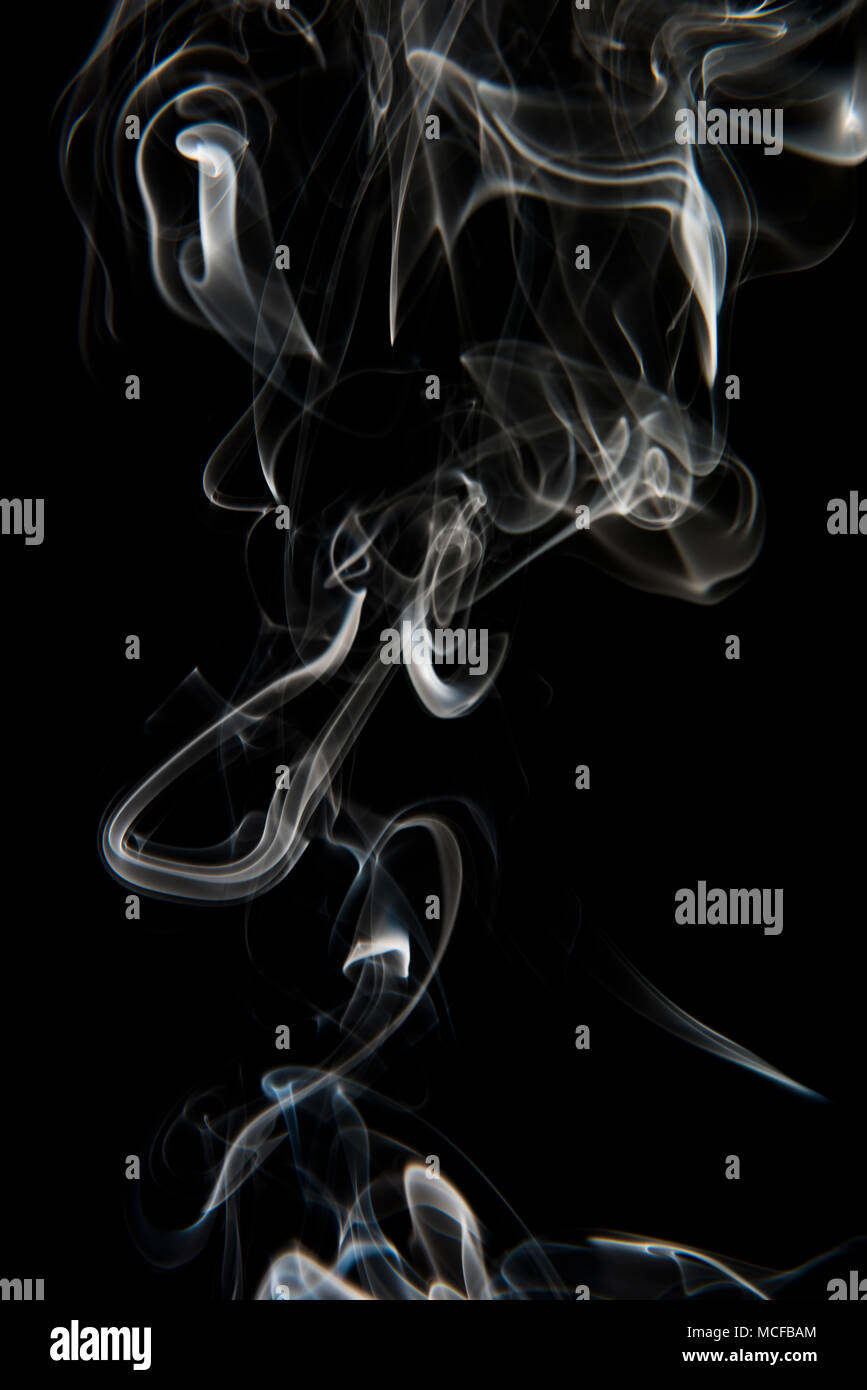 white smoke pattern on black background Stock Photo - Alamy