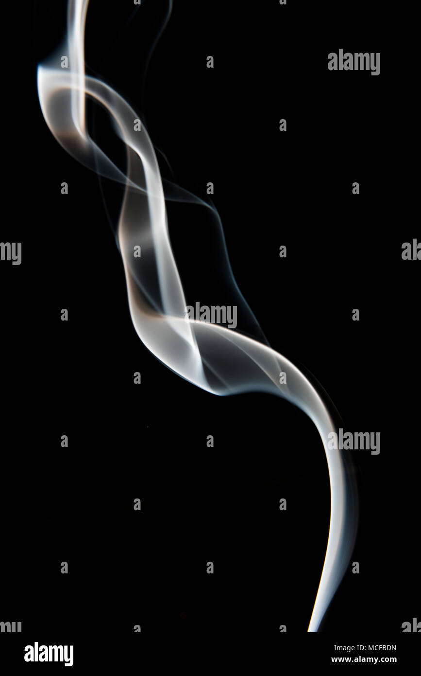 white smoke pattern on black background Stock Photo - Alamy