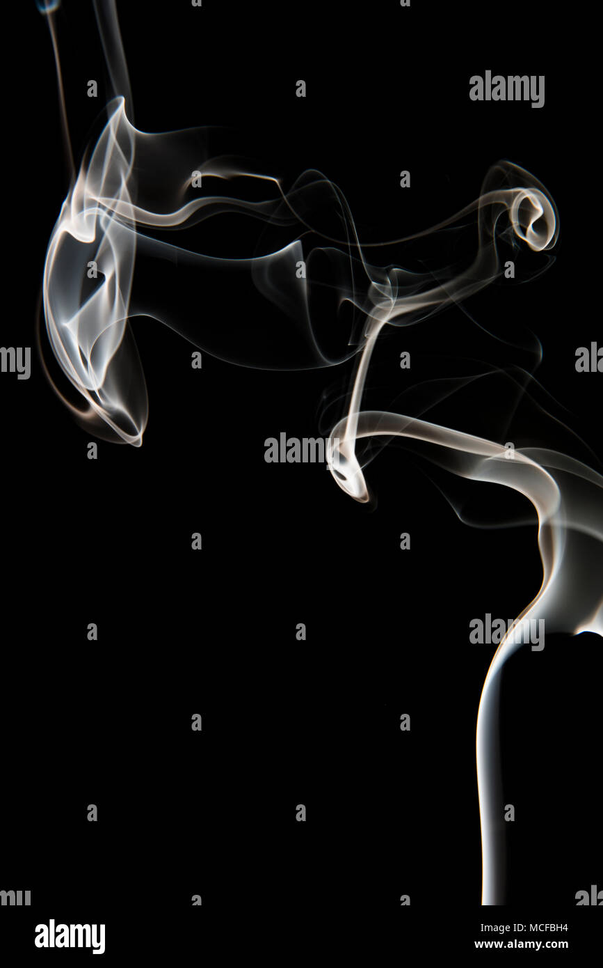 white smoke pattern on black background Stock Photo - Alamy