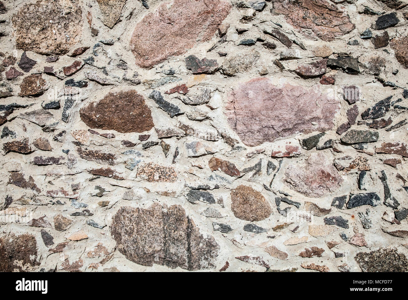Wall of big stones and broken bricks Stock Photo - Alamy