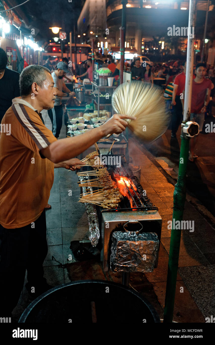 Diners, local, expat and tourist, at Lau Pa Sat, the Satay Club, in the ...