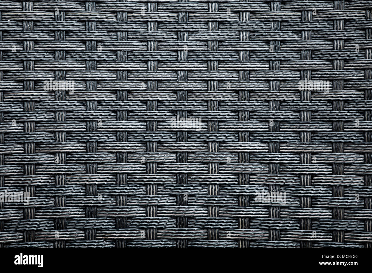 Black rattan background Stock Photo - Alamy