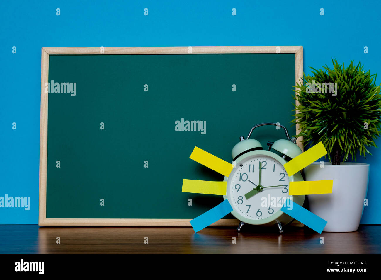 Post it note paper sticky and vintage alarm clock and blank green ...