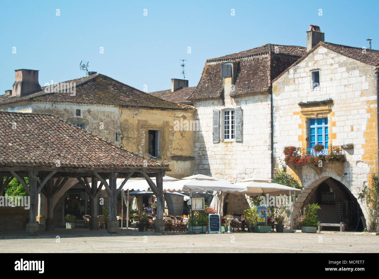 The Central Square in the bastide town of Monpazier, Dordogne, France ...