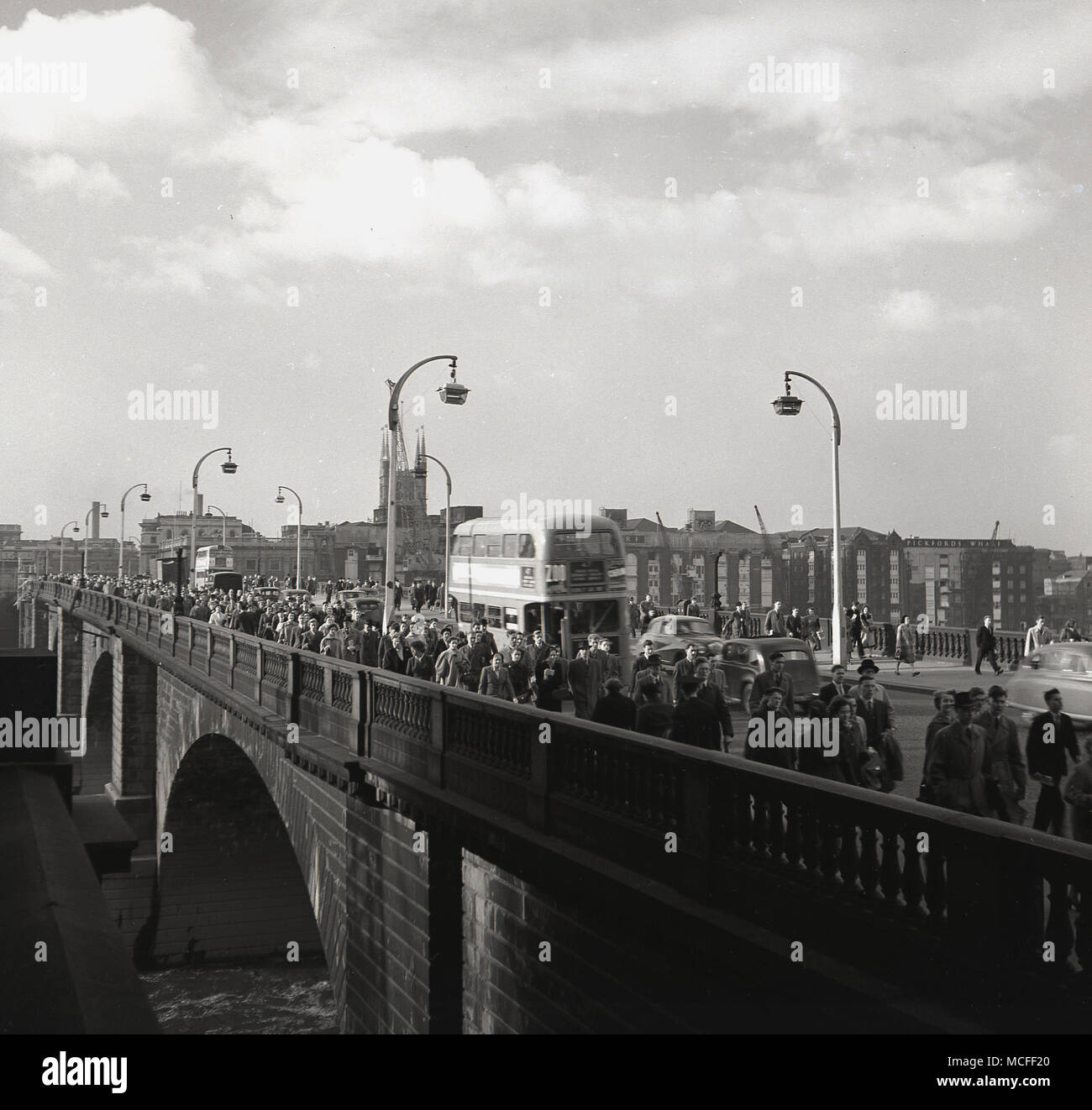 London, 1948, people crossing 'New' London bridge from Southwark on ...