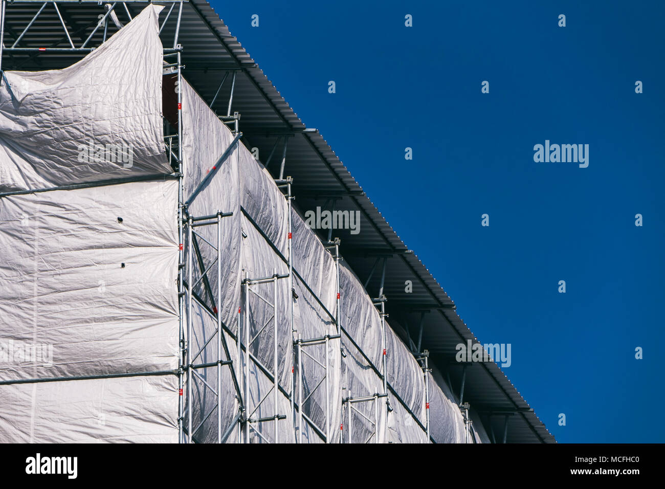 Protective wrap of scaffolding on building under construction Stock ...