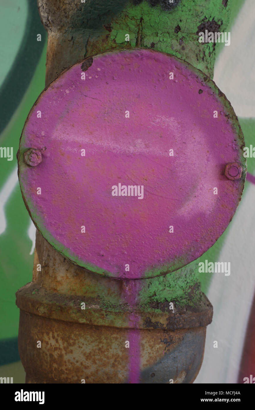 blank fuchsia color metal painted circle Stock Photo - Alamy