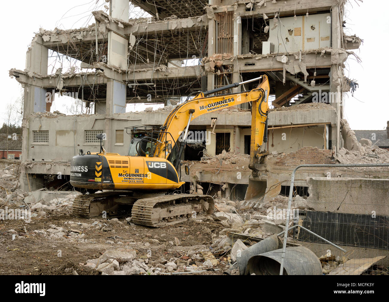 JCB JS 220 demolition excavator clearing concrete rubble and debris on ...