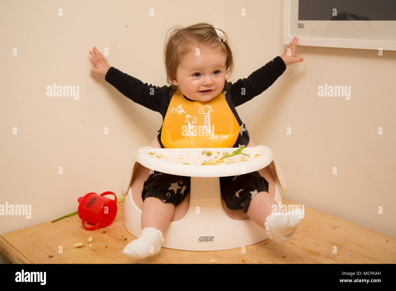 Babies and toddlers having a snack at nursery, UK Stock Photo - Alamy