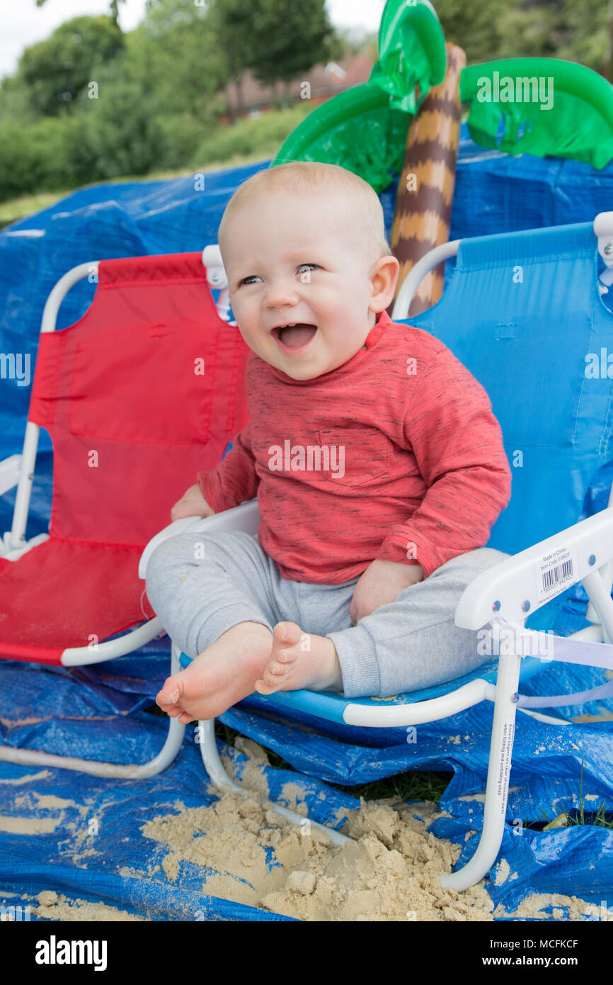12 month old toddler boy smiling and laughing Stock Photo - Alamy