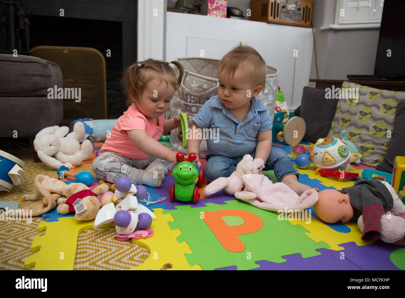 Child girls playing toys table hi-res stock photography and images - Alamy