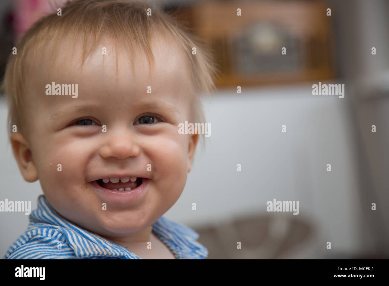 12 month old toddler boy smiling and laughing Stock Photo - Alamy